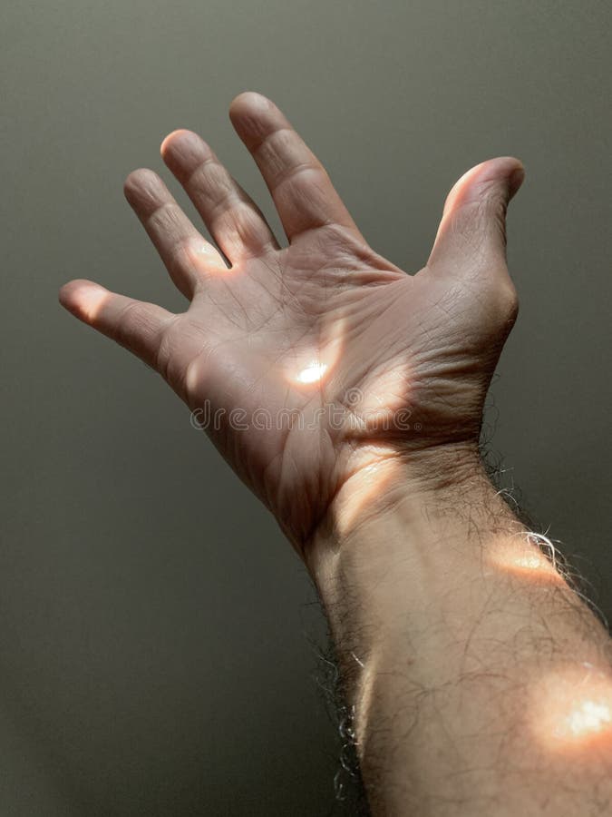 Man s hand and light dots stock photo. Image of power - 265287560