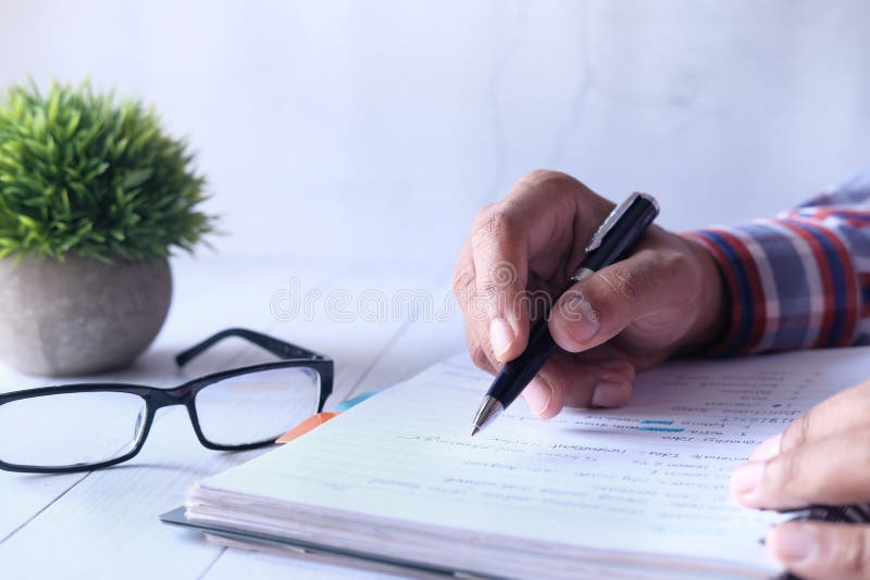 Man`s Hand Writing with Pen on Paper Stock Photo - Image of education ...