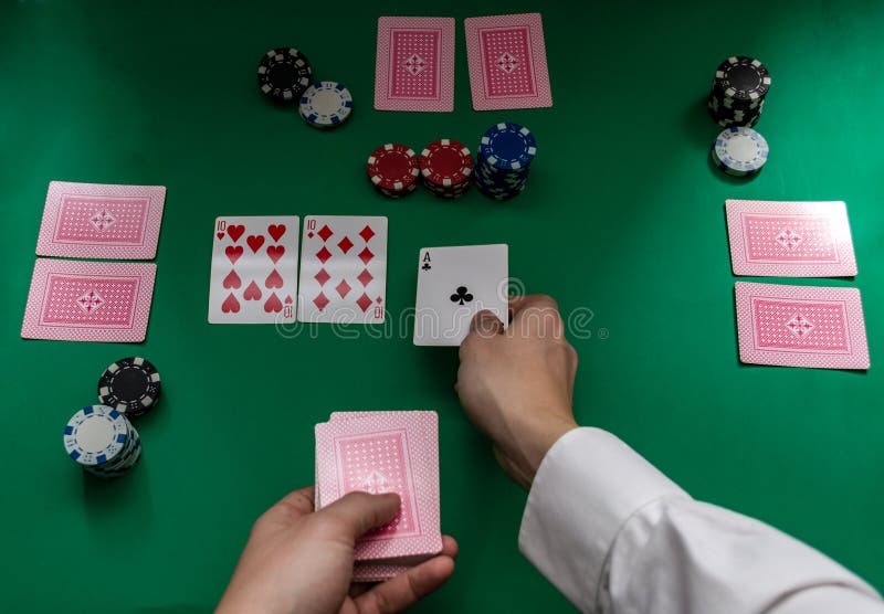 Croupier Dealing Card At Poker Table In Casino Stock Photo - Image of ...