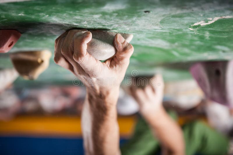 Man`s Hands on Handhold on Artificial Climbing Wall Stock Photo - Image ...