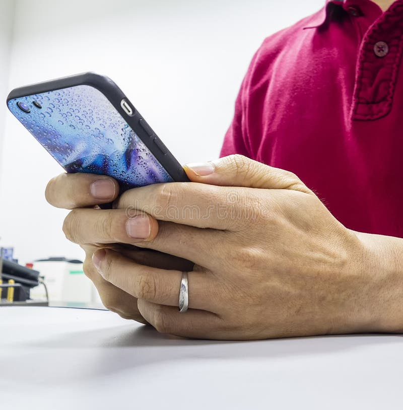 Hands on mobile phones editorial stock image. Image of mobile - 145762409