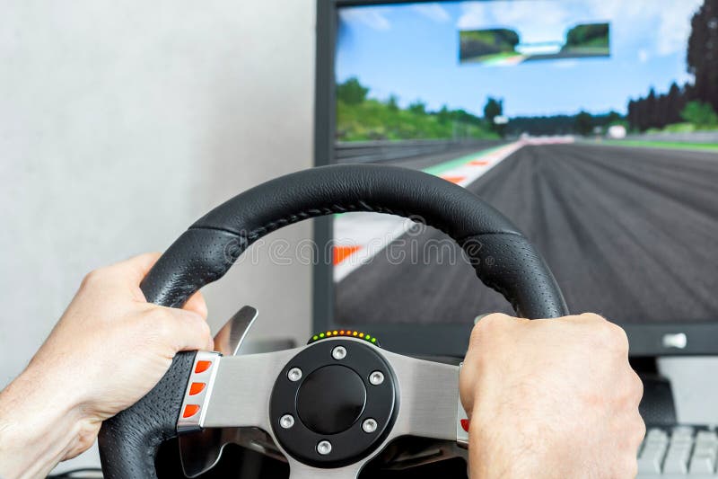 Man S Hands Playing a Racing Simulator on a Steering Wheel Stock Photo ...