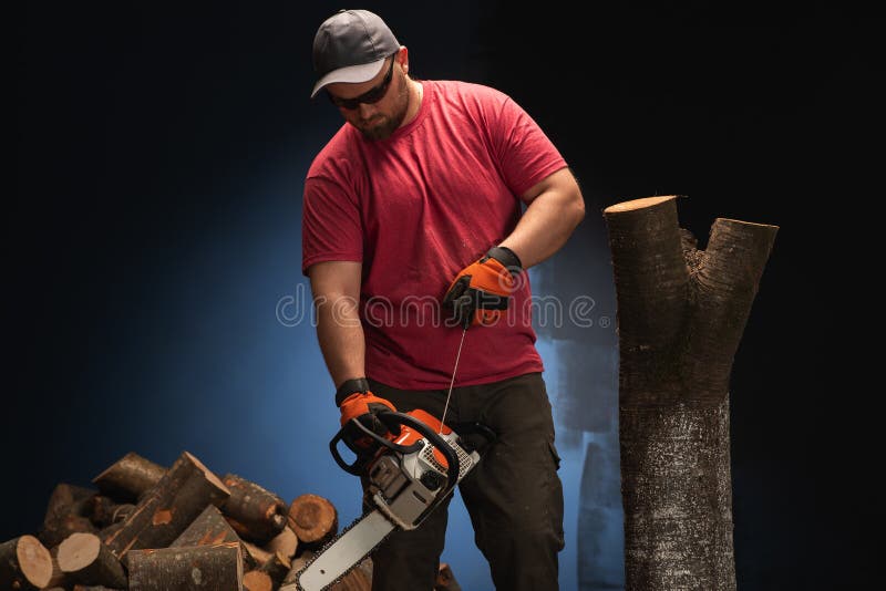 A Man`s Hands Start a Chainsaw Stock Image - Image of equipment, tree ...
