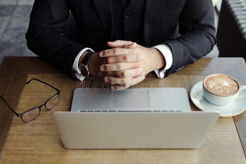 Man`s Hands on the Table with Laptop, Phone, Coffee and Glasses Stock ...
