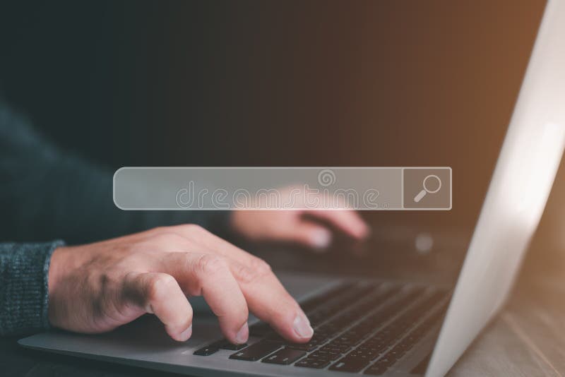 Man`s Hands are Using a Computer Notebook To Searching for Information ...