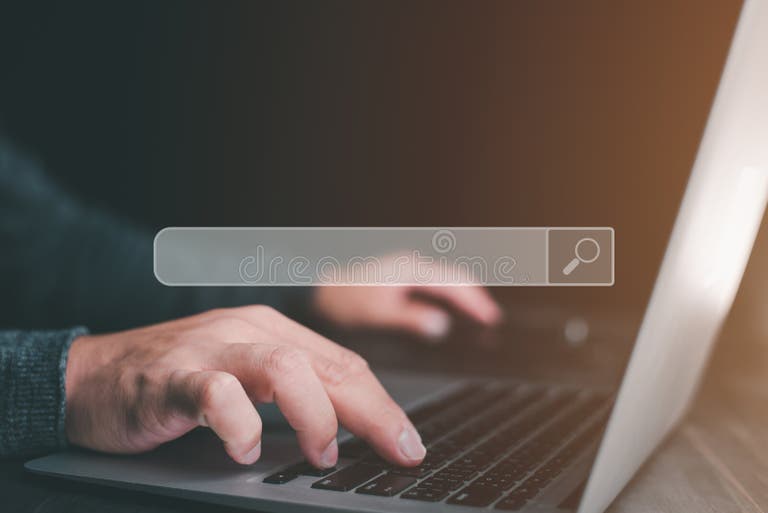 Man`s Hands are Using a Computer Notebook To Searching for Information ...