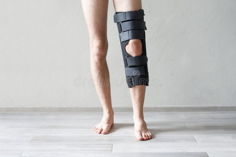 Man S Knee with Braces Orthosis Splint Close Up Stock Photo - Image of ...
