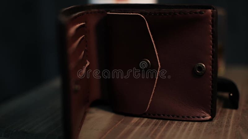 Man S Leather Wallet on a Dark Background Stock Video - Video of ...