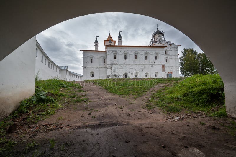 Man S Monastery. Under an Arch Stock Image - Image of light, cross ...