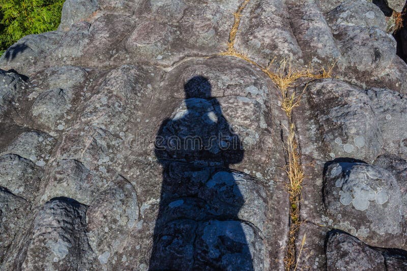 Man`s Shadow on the Rock and Stone Yard. Stock Image - Image of ...