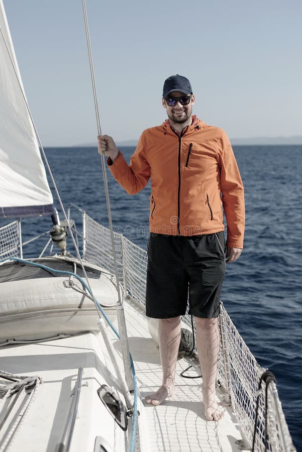 Man sailing with sails out stock image. Image of cruise - 186975473