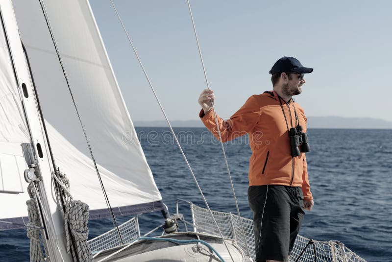Man sailing with sails out stock image. Image of cruise - 186975473