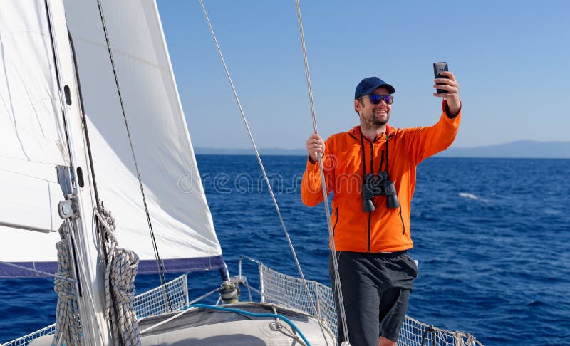Man sailing with sails out stock image. Image of cruise - 186975473