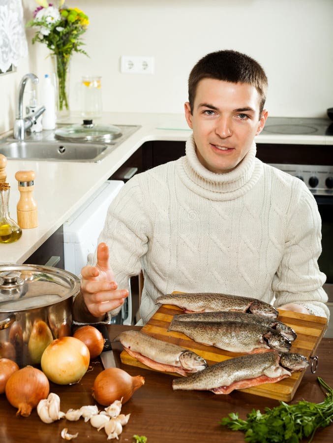 Man with salmon fish stock photo. Image of cheeful, smiling - 43948676