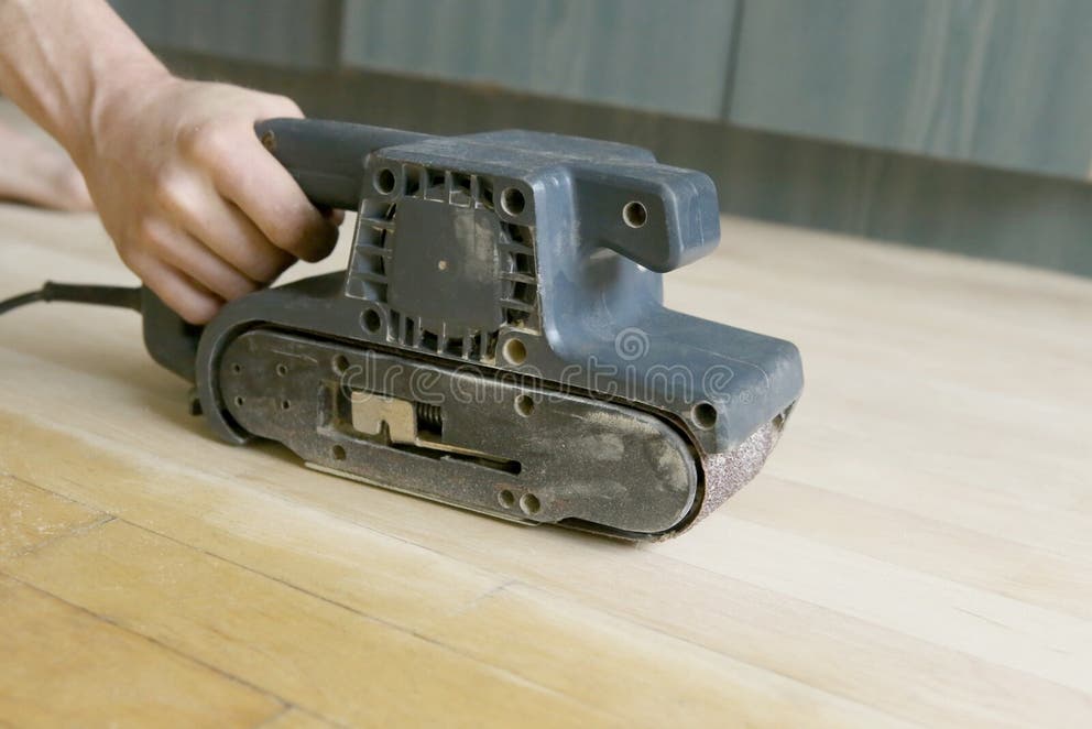 Hand held belt sander. stock image. Image of grinder - 105519579