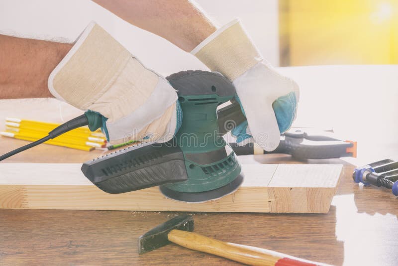 Man Sanding a Wood with Orbital Sander Stock Photo - Image of people ...