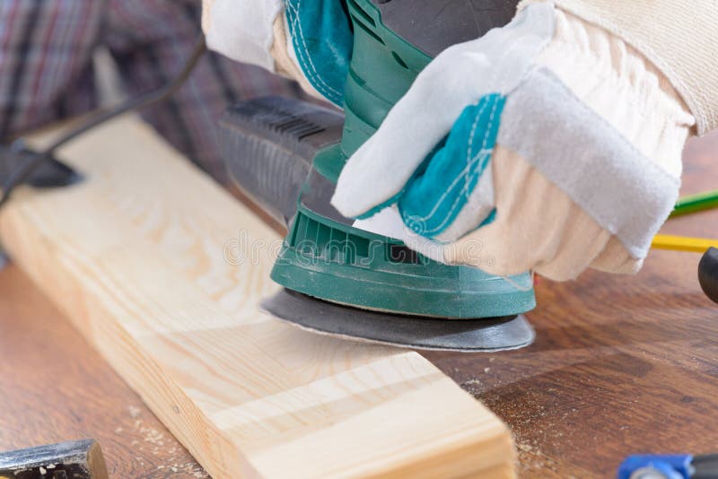 Man Sanding a Wood with Orbital Sander Stock Photo - Image of people ...