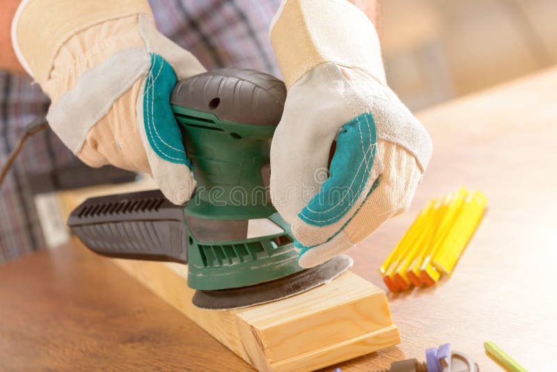 Man Sanding a Wood with Orbital Sander Stock Image - Image of plank ...