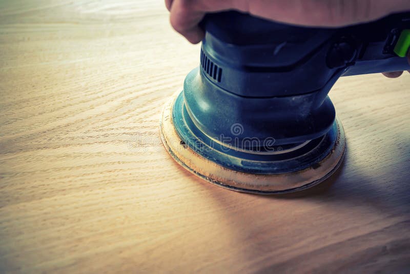 Man Sanding Wood with Orbital Sander in a Workshop Stock Image - Image ...