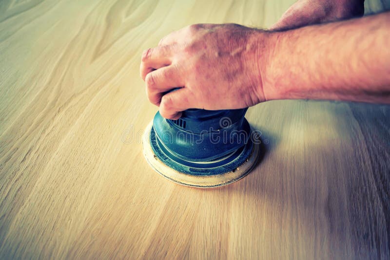 Man Sanding Wood with Orbital Sander in a Workshop Stock Photo - Image ...