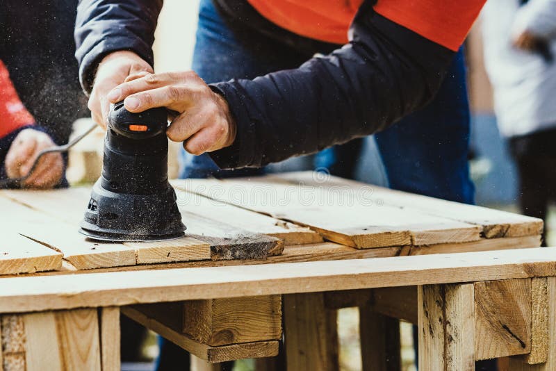 Man Sanding Wood Planks with a Grinder Stock Image - Image of hand ...