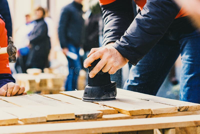 Man Sanding Wood Planks with a Grinder Stock Image - Image of carpenter ...