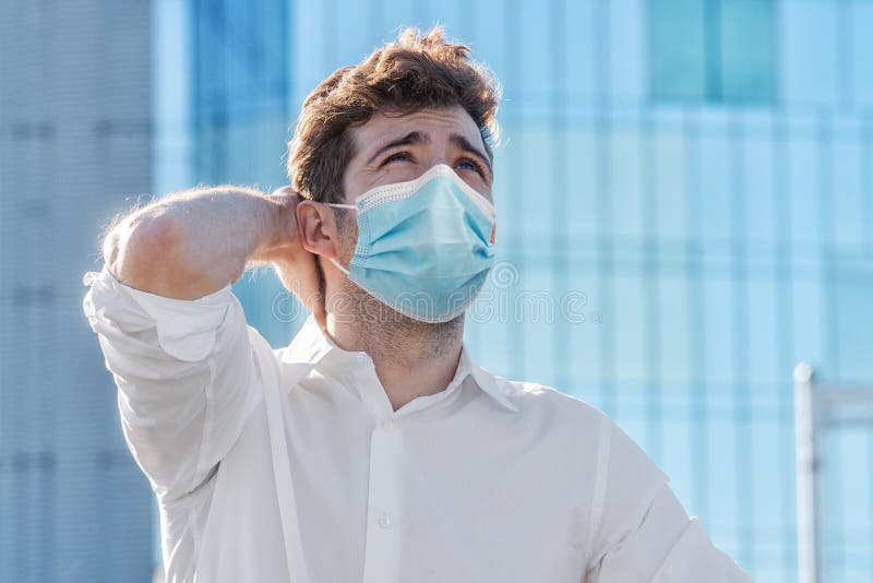 Man with Sanitary Mask and Expression of Concern Stock Photo - Image of ...