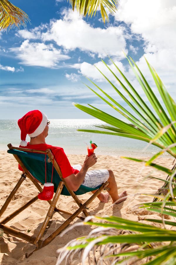 Relaxed Santa Claus Sitting on a Chair, on a Beach, Enjoying Stock ...