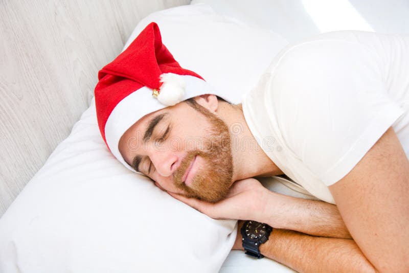 Man with santa hat stock photo. Image of bedtime, adult - 63171210