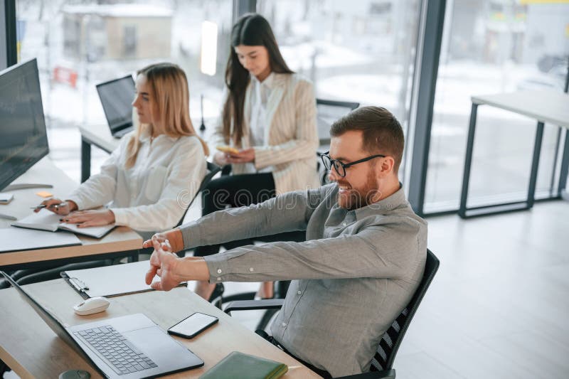 Man is Satisfied about Results. Successful Team are Working Together in ...