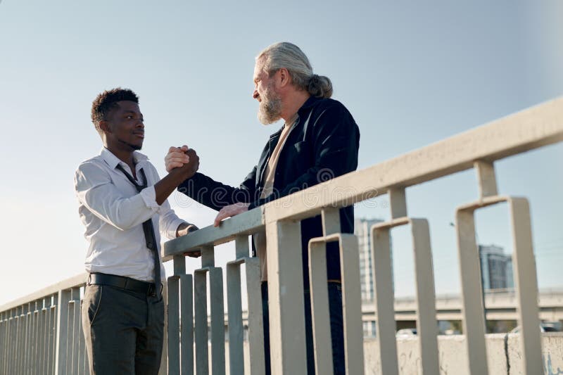 Man Saving the Guy from Accident Stock Image - Image of conversation ...
