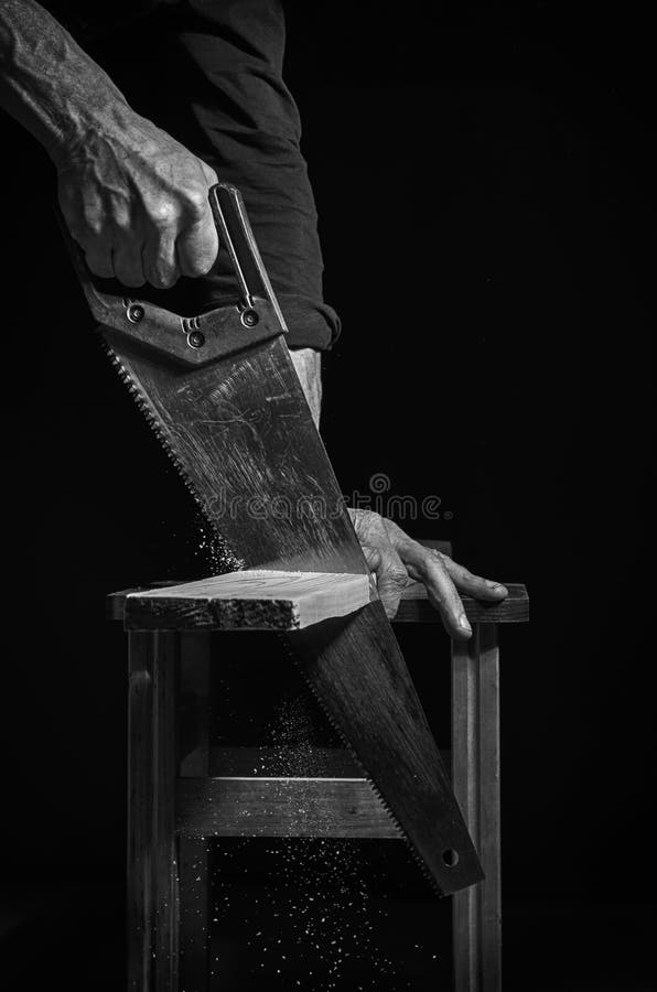 Man Sawing a Board with a Hand Saw Stock Image - Image of work, wooden ...