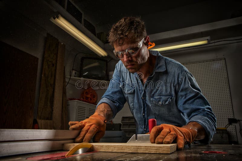 Man sawing boards stock image. Image of handyman, handy - 33530405