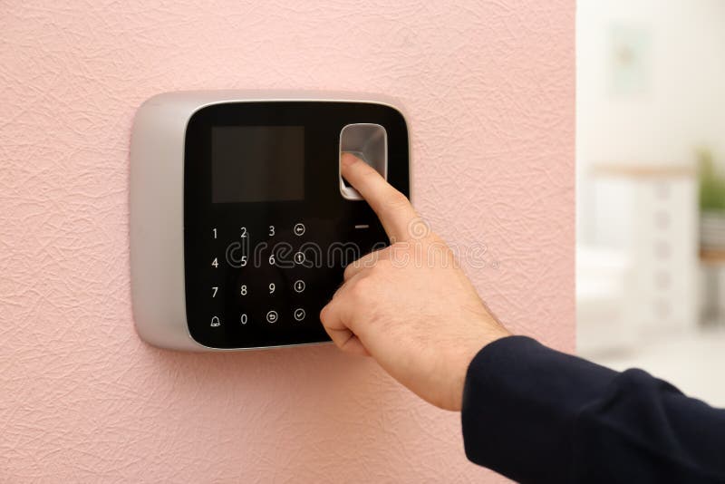 Man Scanning Fingerprint on Alarm System at Home Stock Image - Image of ...