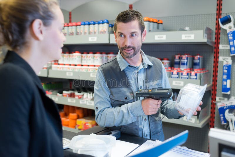 Man Scanning by Handheld Device Stock Image - Image of factory, retail ...