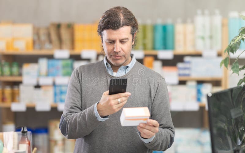 Man Scans Code on Package of Pills To Check Expiration Date Stock Image ...