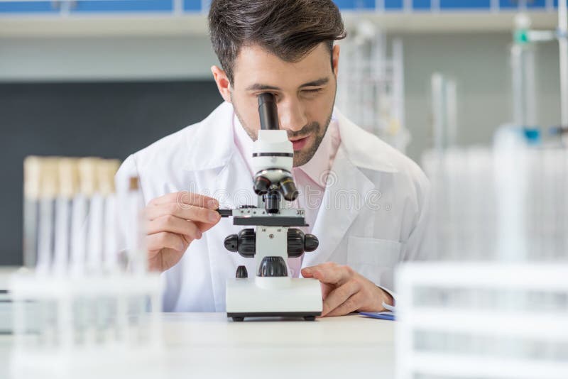 Man Scientist in White Coat Working with Microscope Stock Image - Image ...