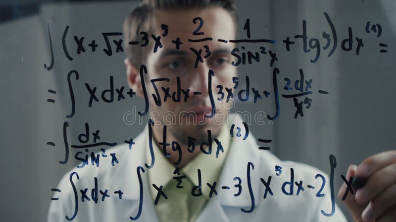 Man Scientist Writes the Integral Equation on the Glass. a ...