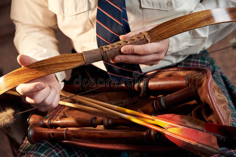 Man Warrior Keeping in the Hands of Arrow Stock Image - Image of dress ...
