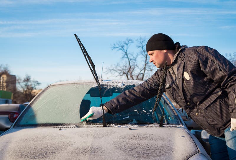 Man Scraping Front Windshield Stock Photo - Image of covered, window ...