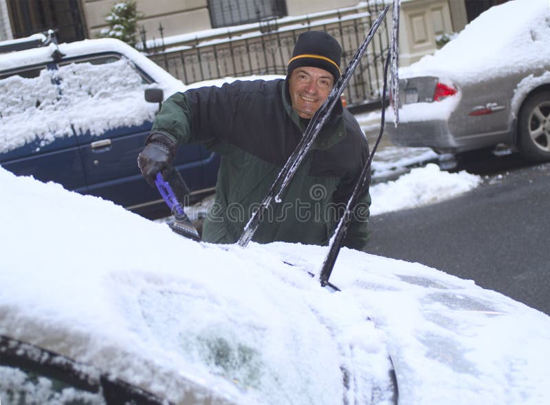 Man Scraping Snow from Windshield Stock Photo - Image of automobile ...