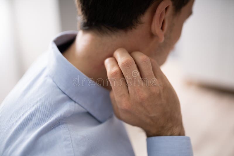 Man Scratching His Neck stock photo. Image of neck, head - 210732506