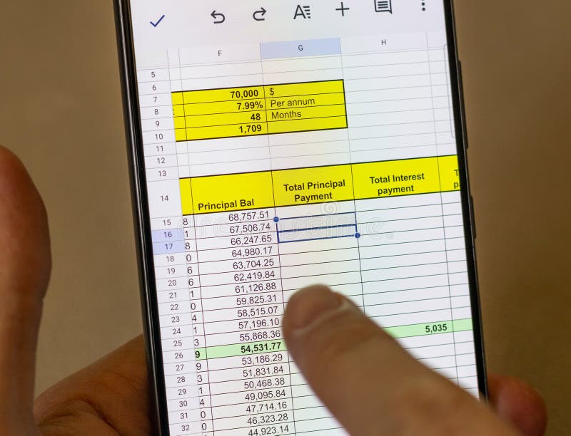 Man Scrolling an Excel Sheet on the Phone Screen Showing Bank Loan ...