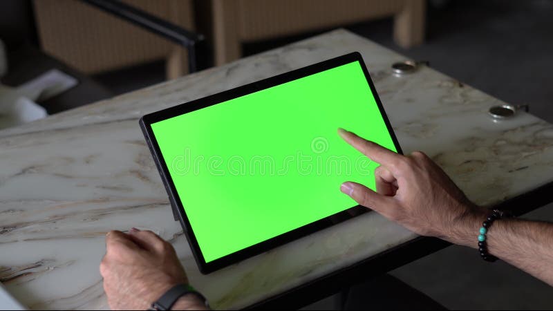 Man Scrolling on a Green Screen Tablet Stock Video - Video of factory ...