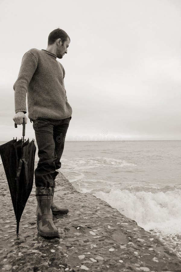 Man and sea stock image. Image of silhouette, beach, seascape - 7702665