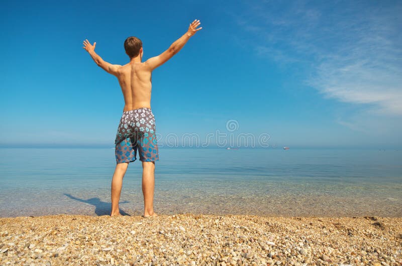 Man on the sea stock photo. Image of relax, holiday, back - 89557214