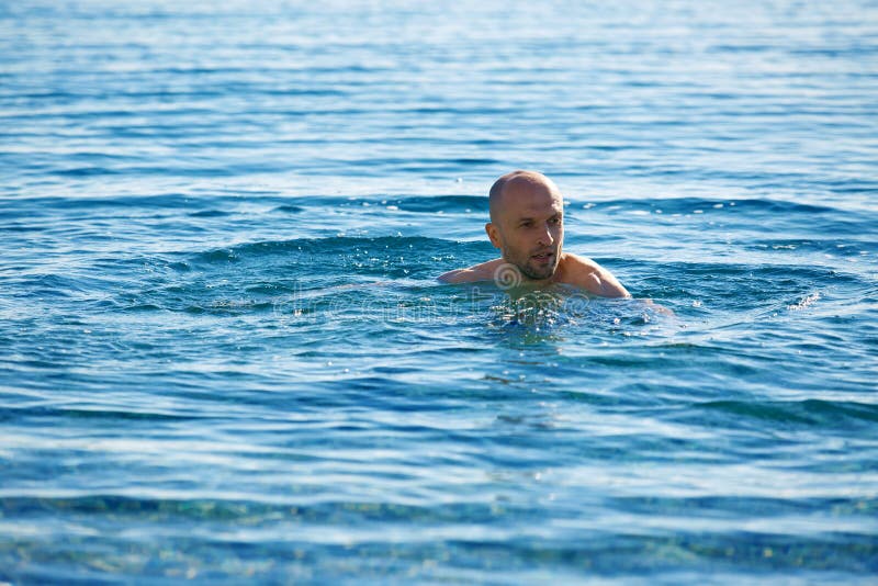Man in the sea stock image. Image of summer, head, healthy - 66078441
