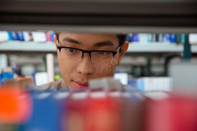 Man Searching Book in Library Stock Photo - Image of bookstore ...