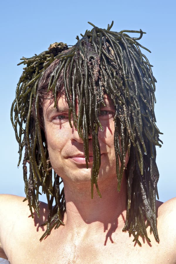 Man with seaweed stock image. Image of expression, person - 14499949
