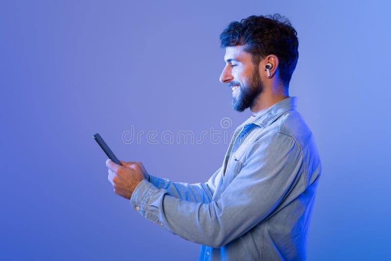 Man Holding Cell Phone in Hand, Studio Background Stock Photo - Image ...